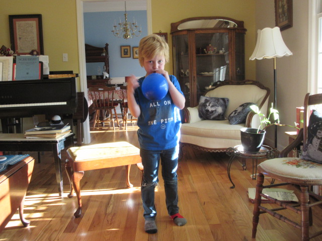 Logan Blows up a Balloon – Mehrling Muse